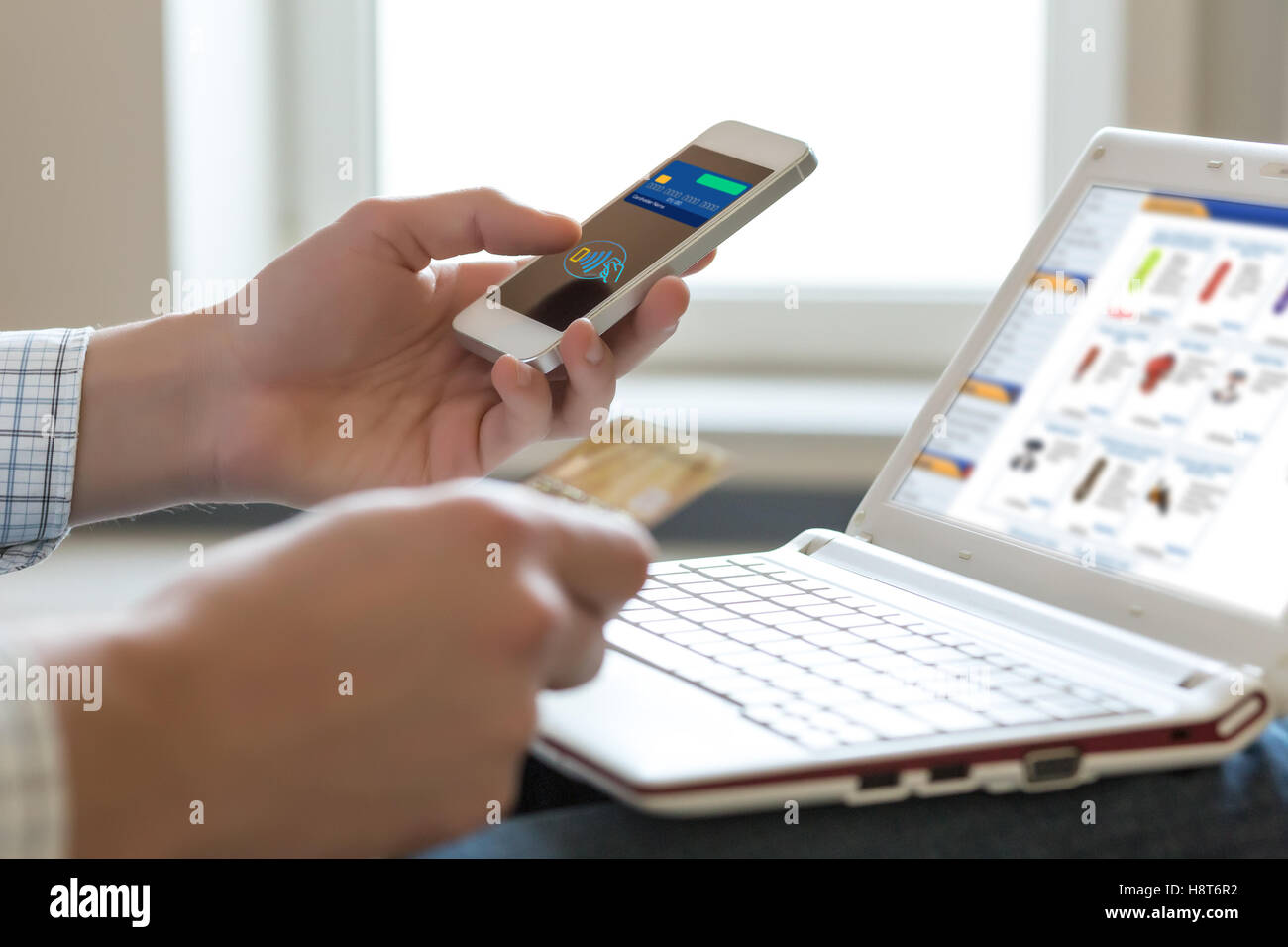 Person shopping making Mobile Payment with Telephone Stock Photo - Alamy