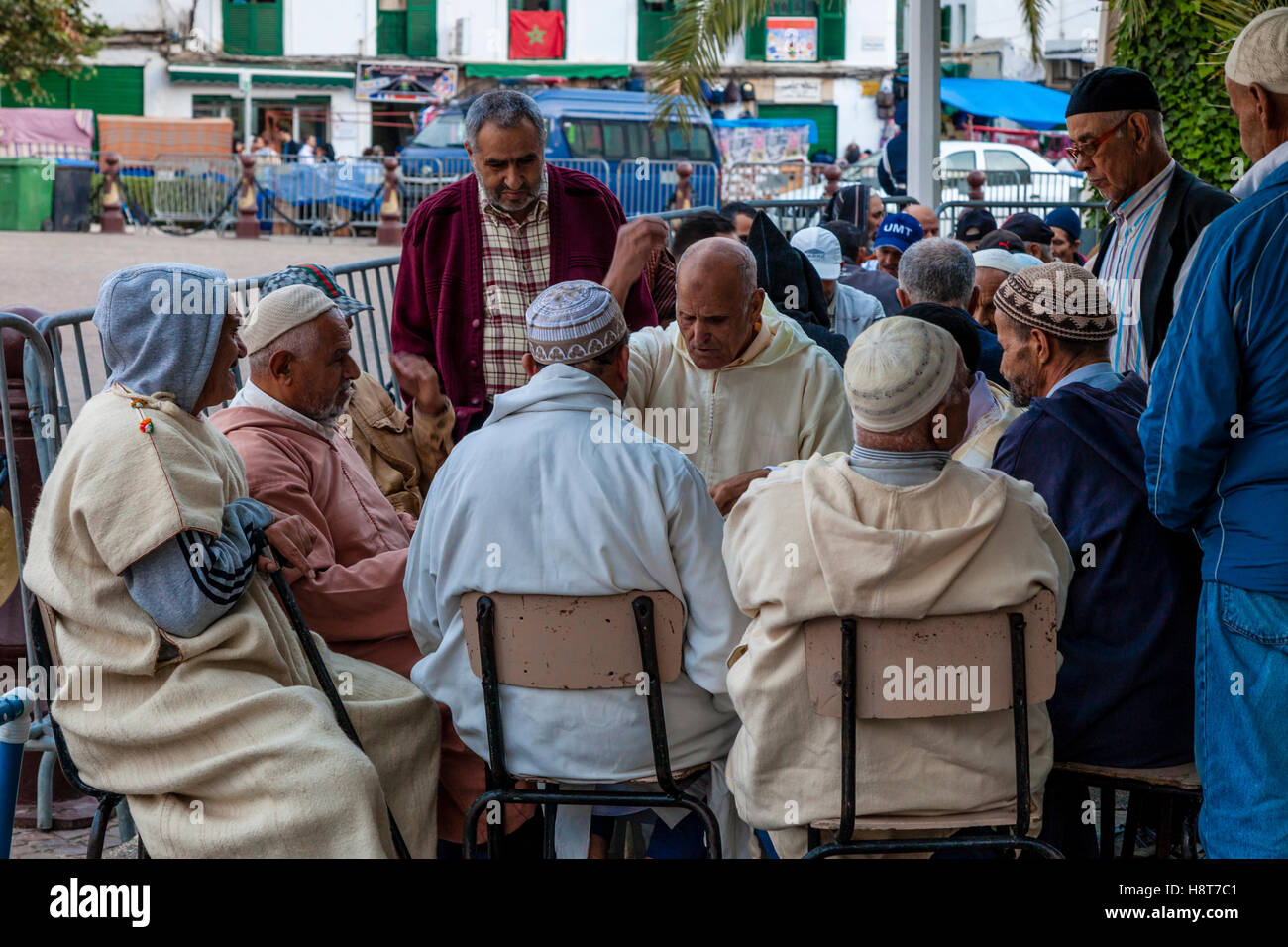 Local Men Play A Traditional Board Game In The Street, Tetouan, Morocco ...