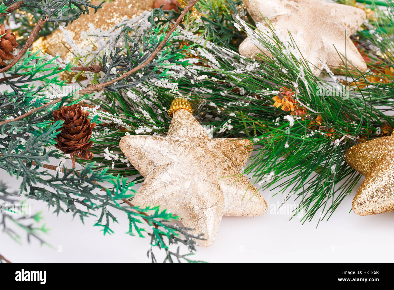 Christmas yellow stars and fir tree on gray background Stock Photo - Alamy