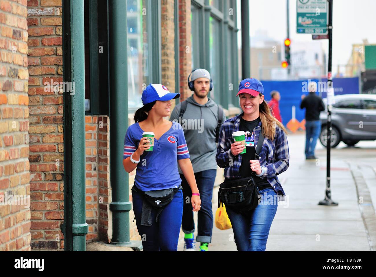 Chicago Cubs fans walking along Clark Street near Wrigley Field in the ...