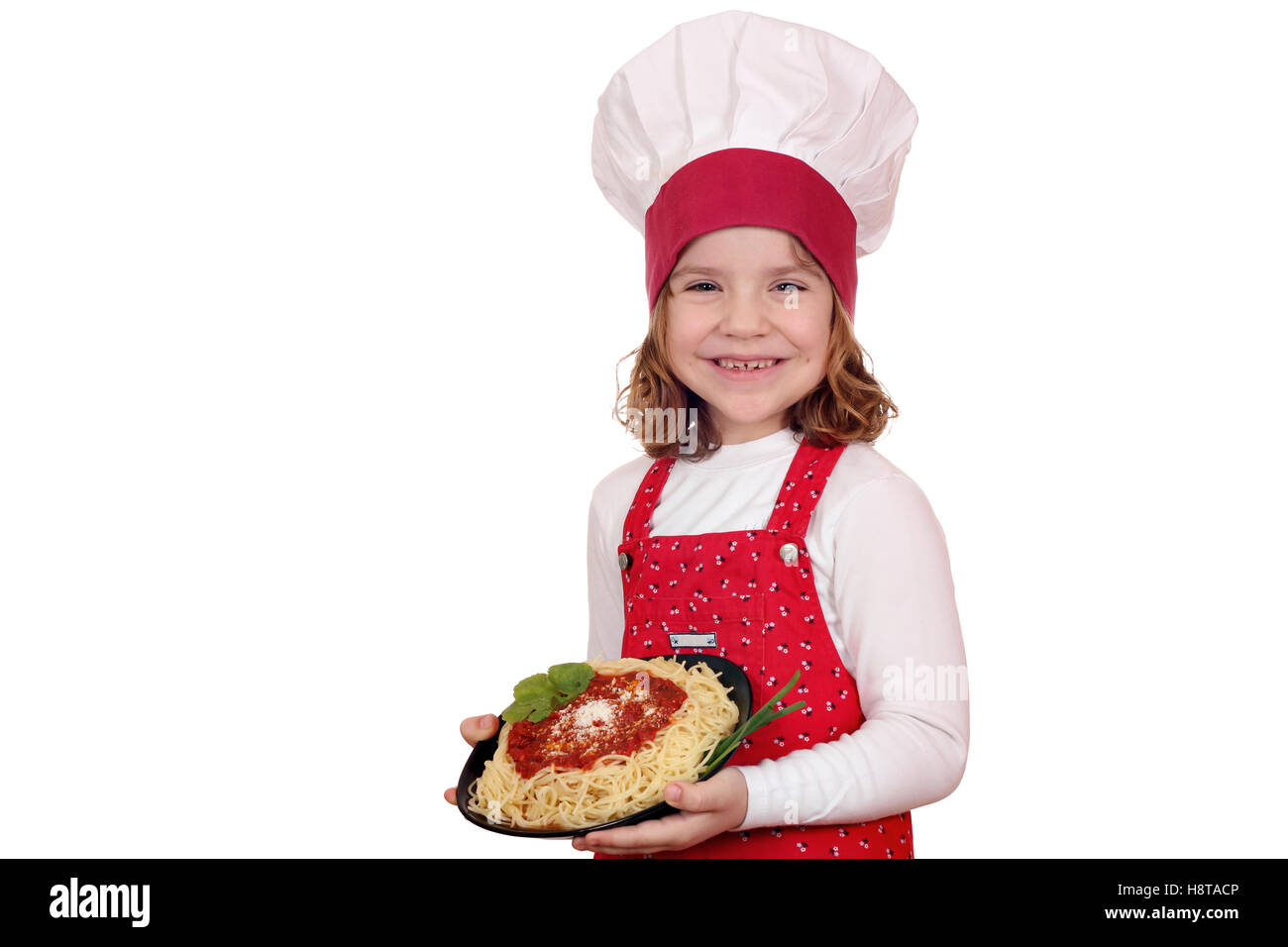 happy little girl cook with delicious spaghetti Stock Photo - Alamy