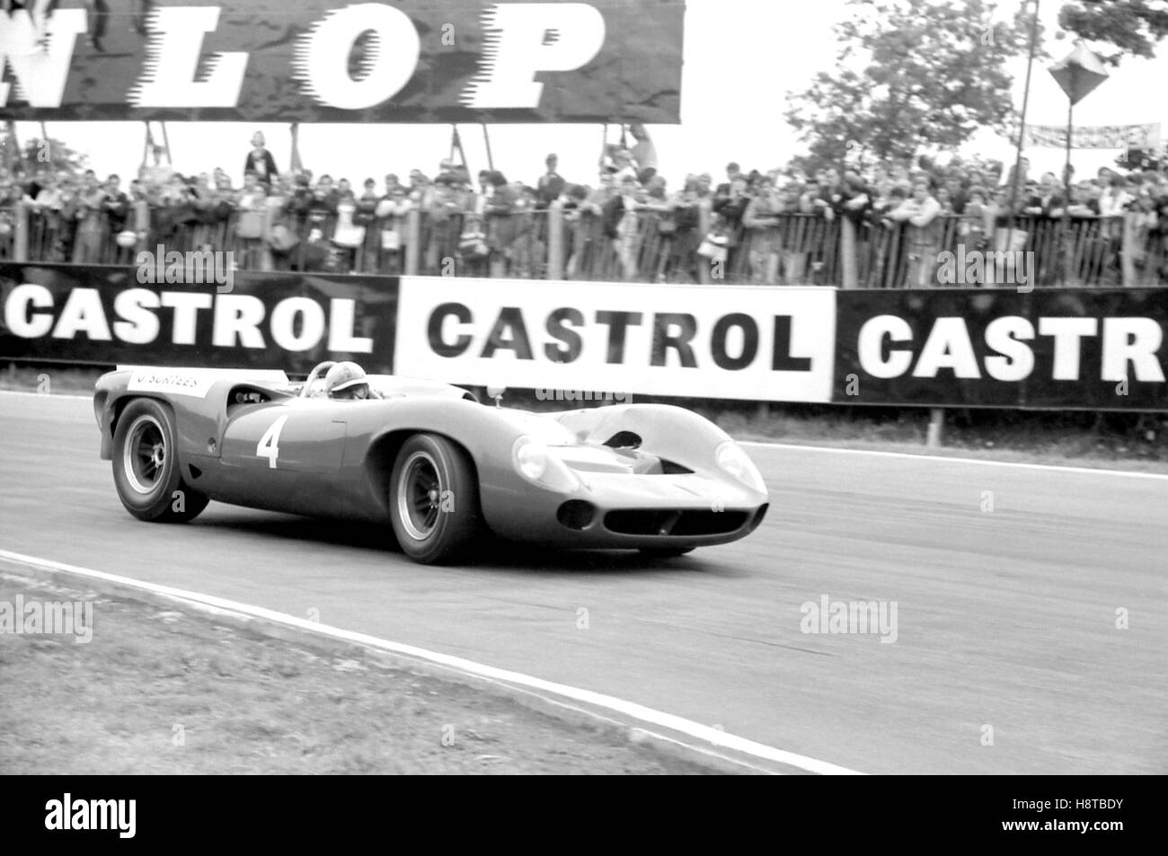 1965 AUGUST BRANDS JOHN SURTEES LOLA T70 SPYDER WINNER Stock Photo - Alamy
