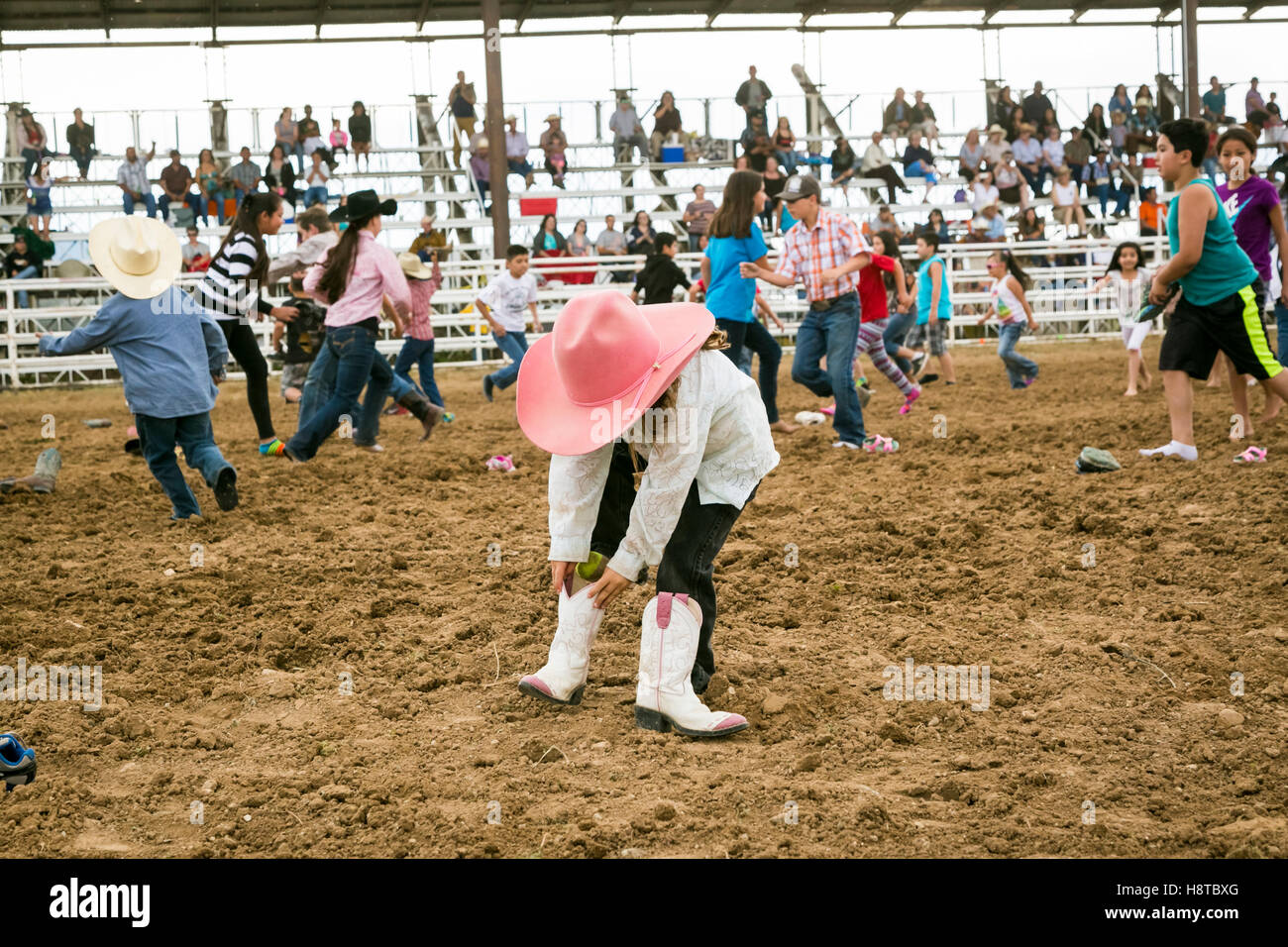 Taos, New Mexico, USA. Small town western rodeo.Children participating ...