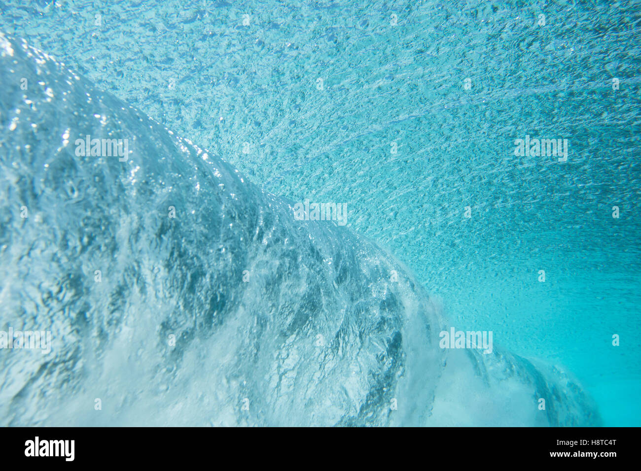 Underwater view of the back of a wave Stock Photo - Alamy