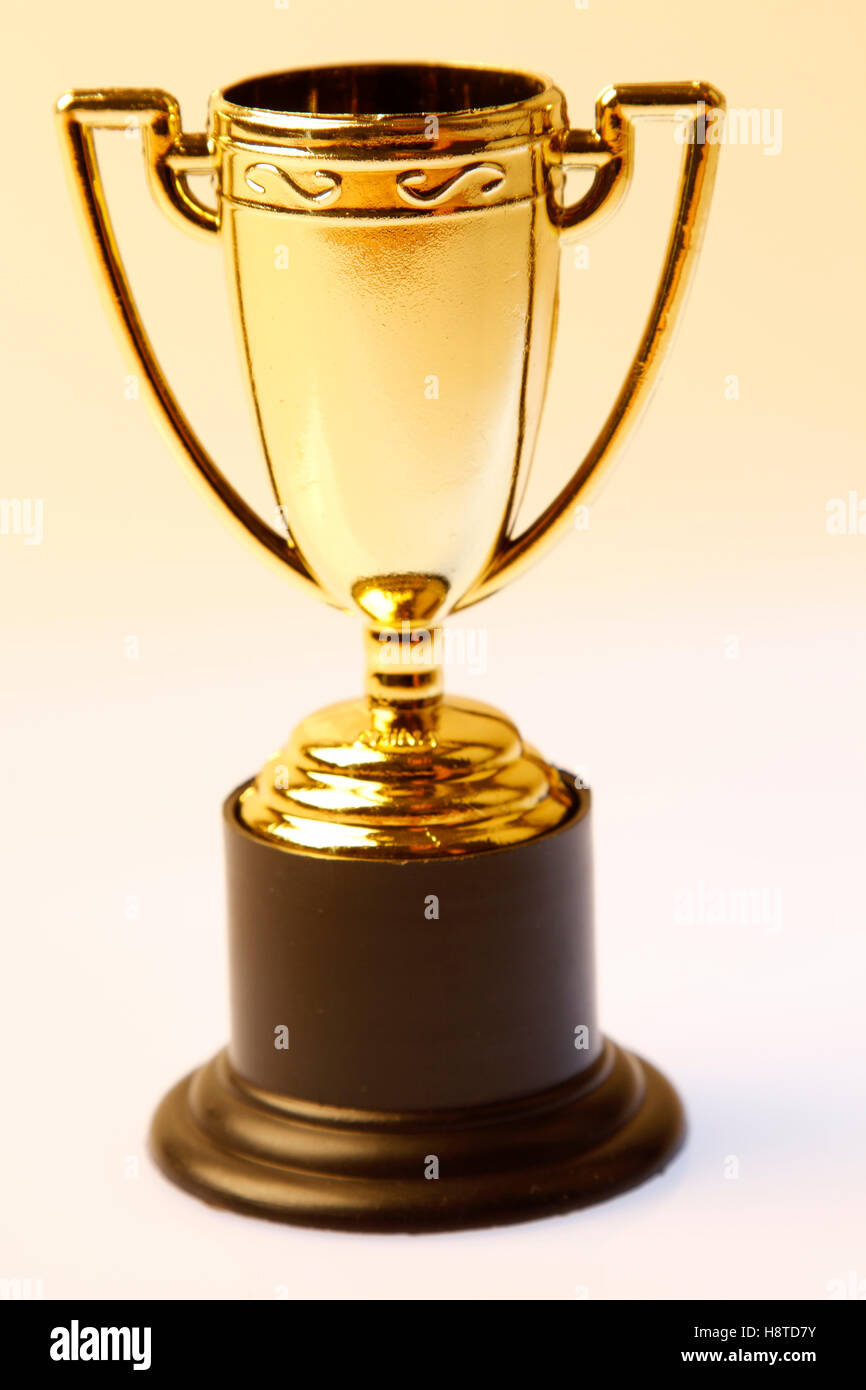 Golden trophy cup closeup Stock Photo - Alamy