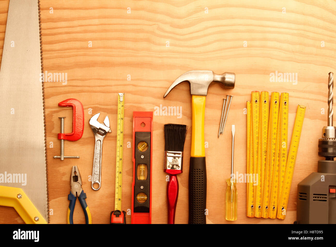Assorted work tools on wood Stock Photo - Alamy