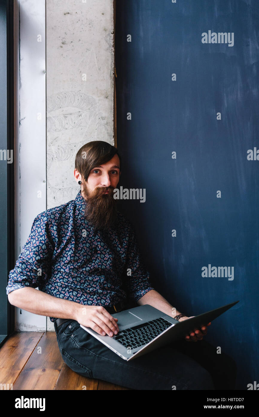 Portrait of a handsome hipster Stock Photo - Alamy