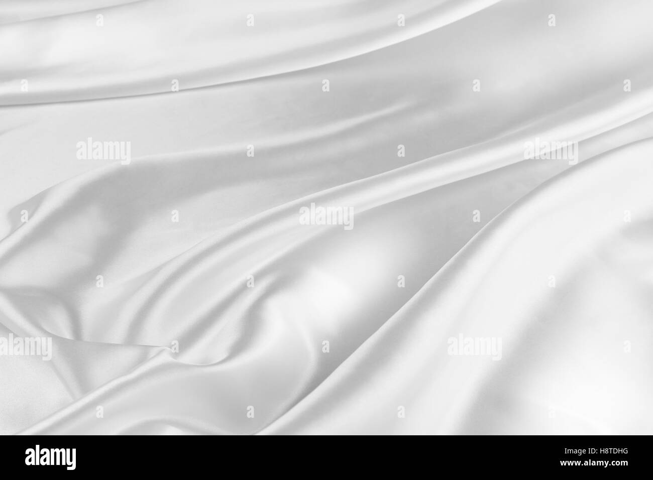 Closeup of rippled white silk fabric Stock Photo - Alamy
