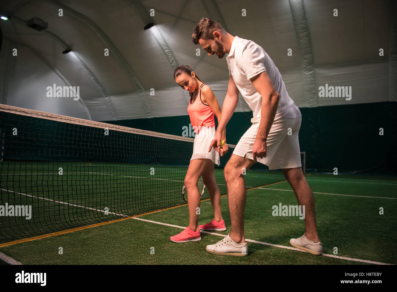 Instructor positive woman tennis hi-res stock photography and images ...