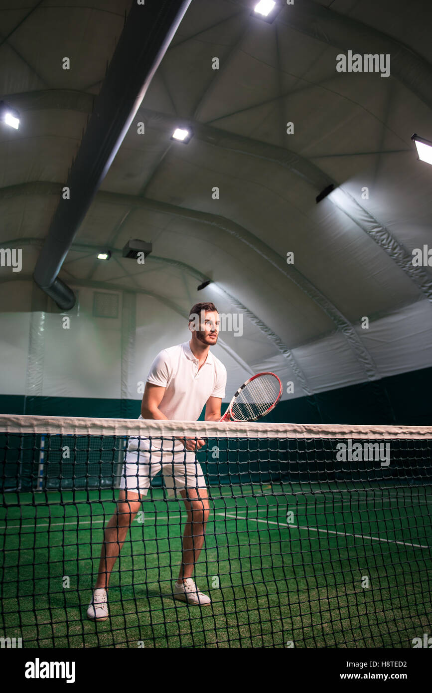 Handsome professional man playing tennis Stock Photo - Alamy