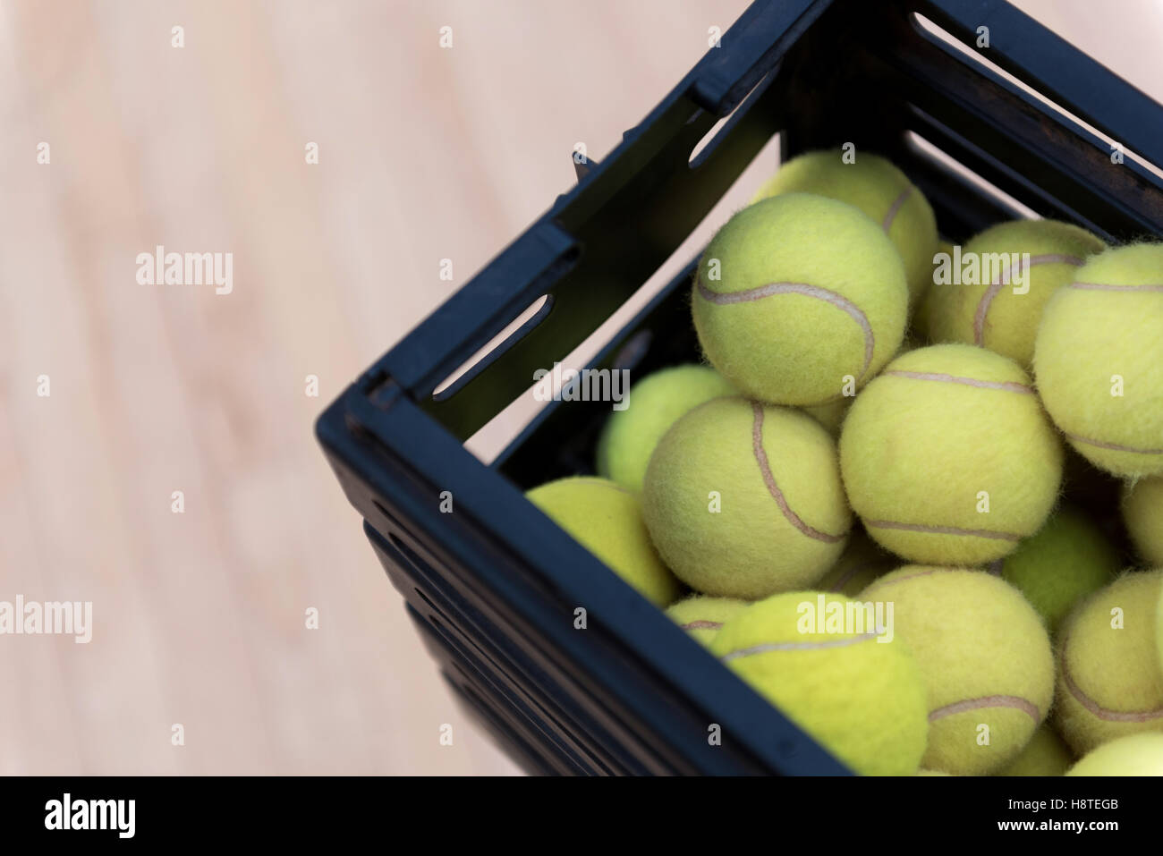 Tennis balls lying in the box Stock Photo - Alamy