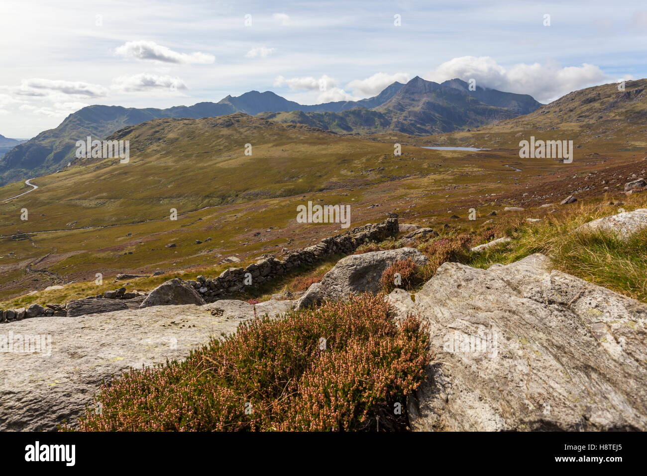 Clouds just cap the summit of Snowdon, as viewed from the flanks of ...