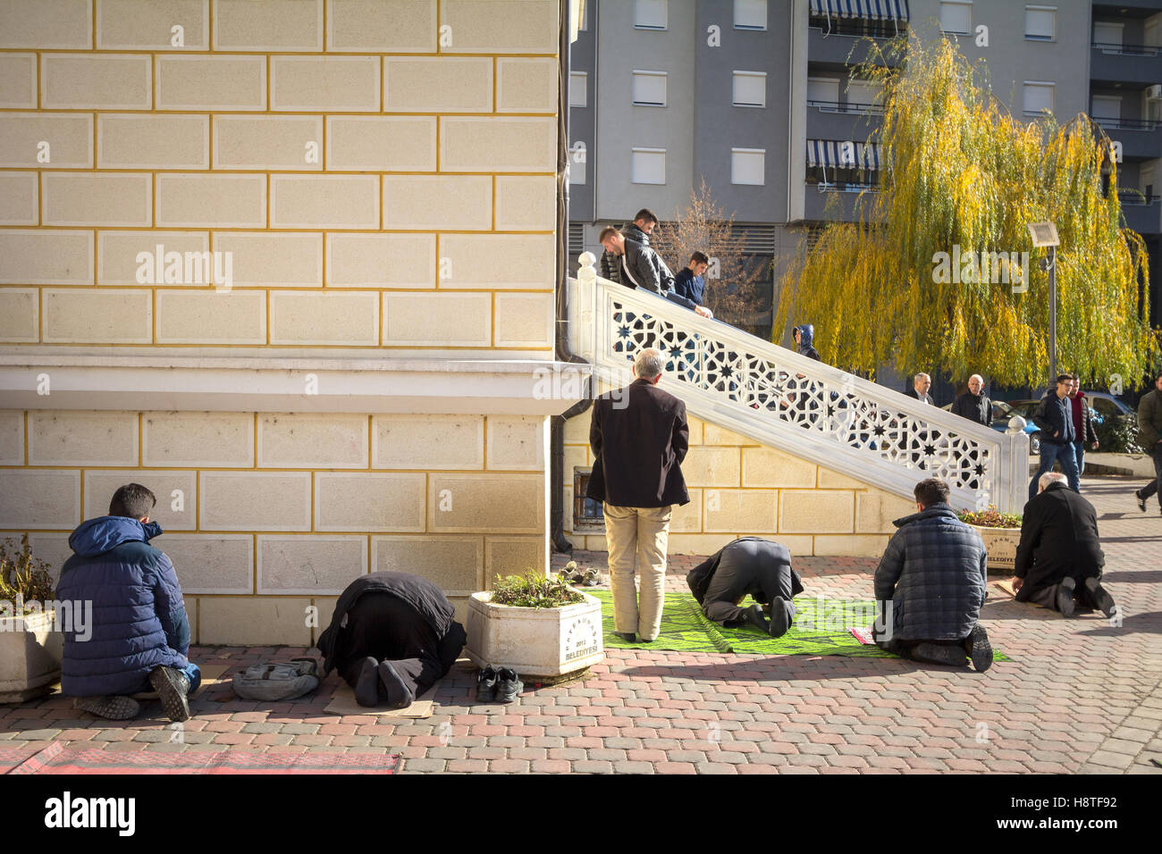 Kosovo Albanian muslims praying in front of the Isa Beg Mosque in ...