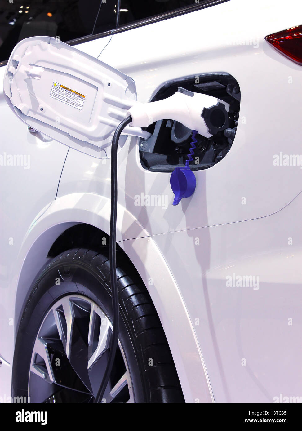 Electric vehicle with plug-in technology Stock Photo - Alamy