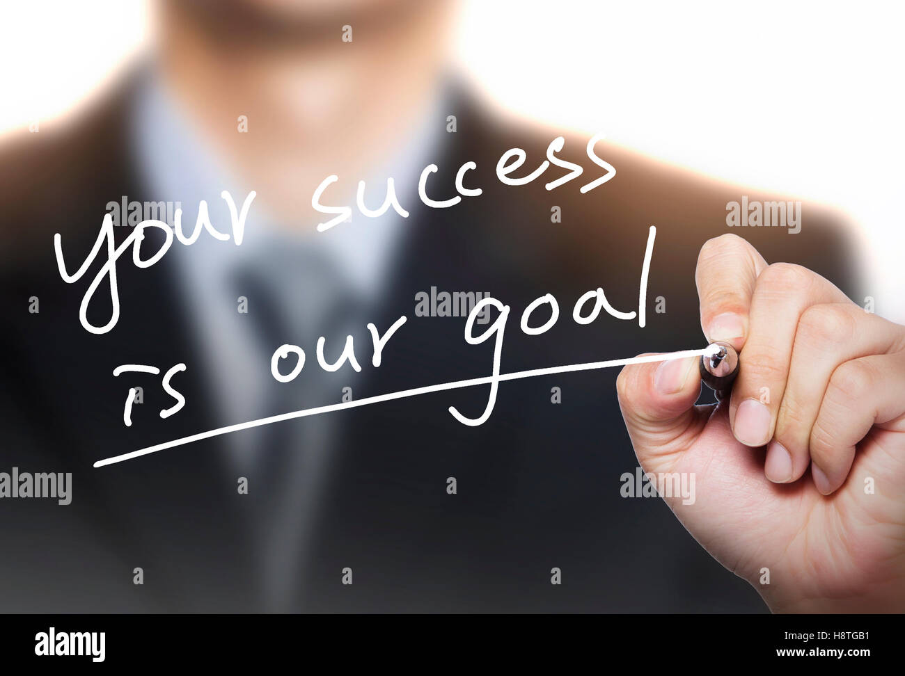 your success is our goal written by hand, hand writing on transparent ...