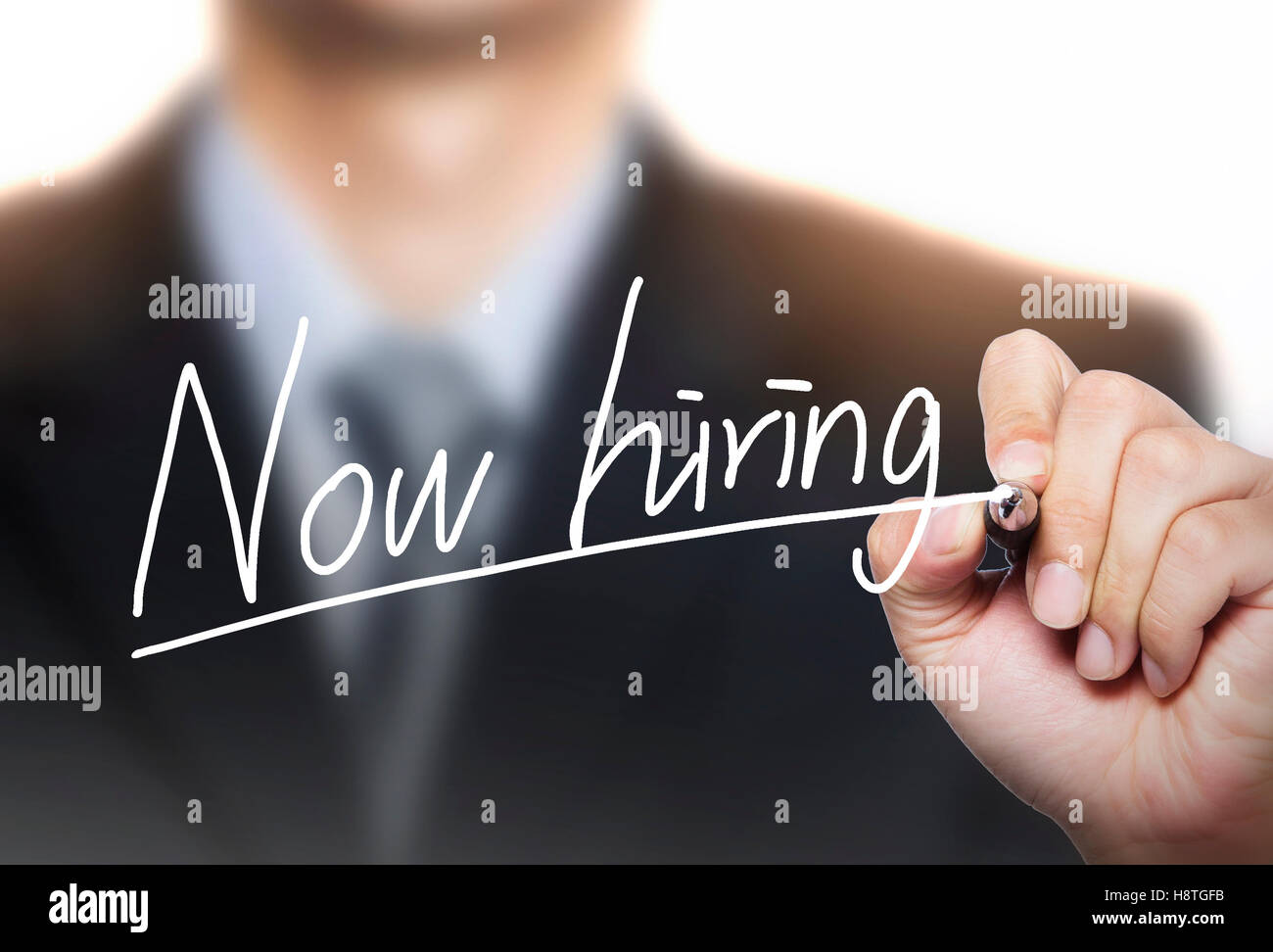 now hiring written by hand, hand writing on transparent board, photo ...