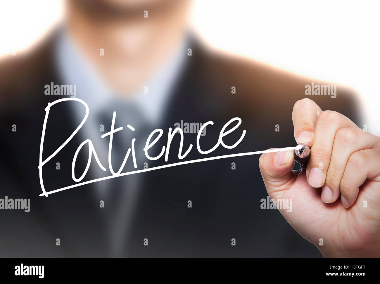 patience written by hand, hand writing on transparent board, photo ...