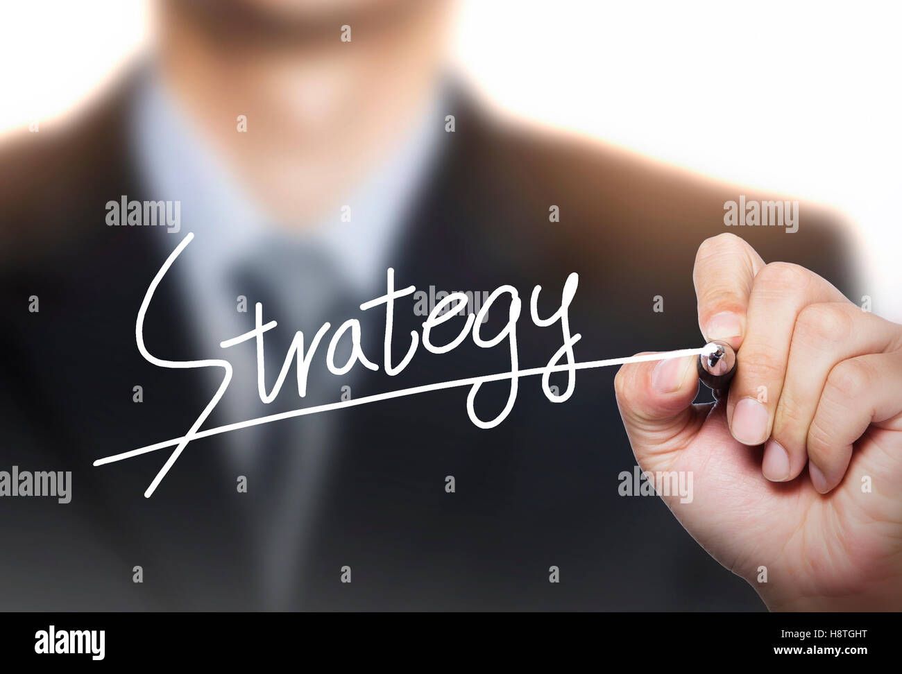 strategy written by hand, hand writing on transparent board, photo ...