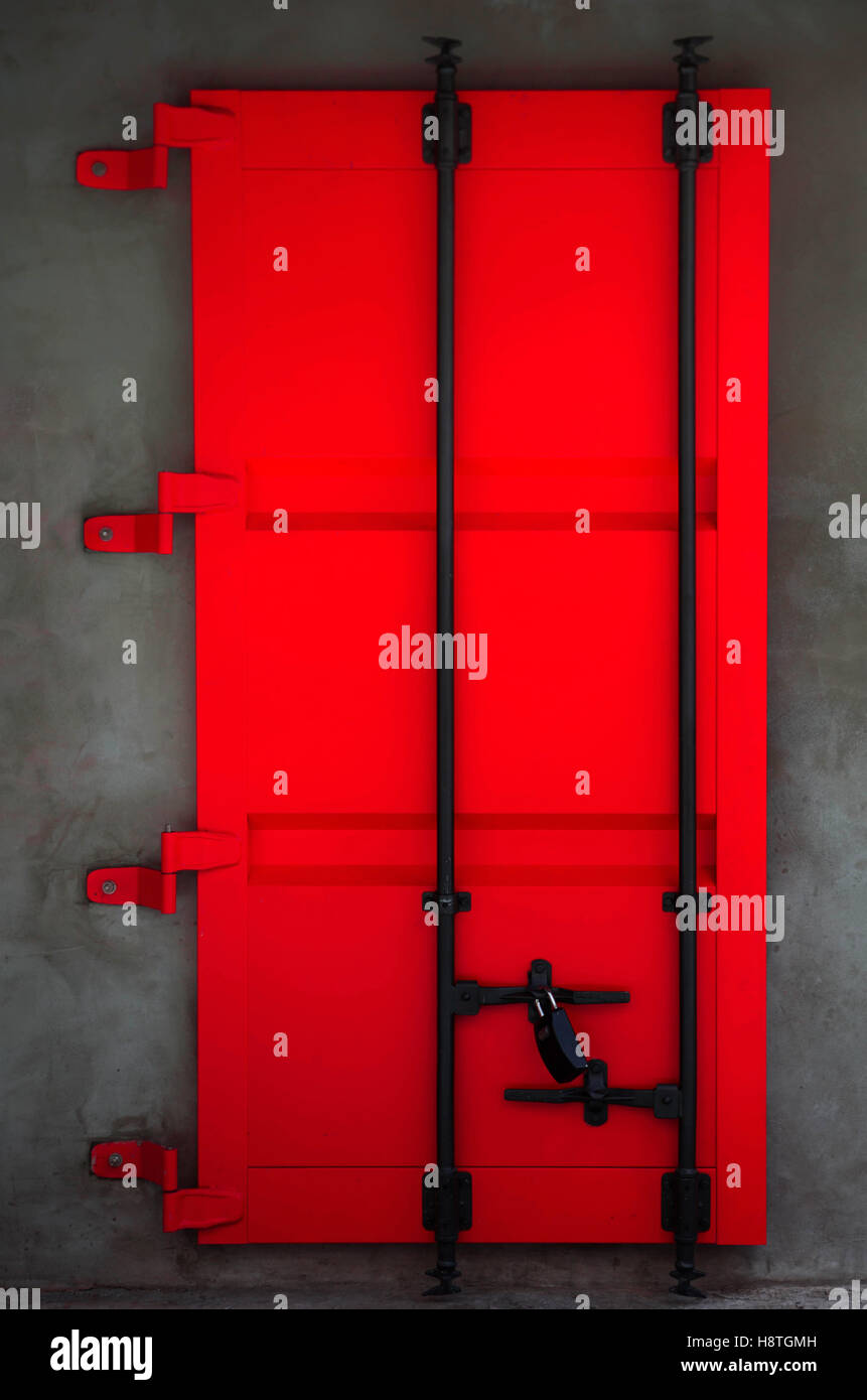 Metal red door background, close up look of attractive locked door ...