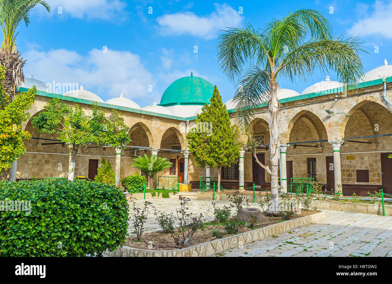 The green dome on the corner building of Al-Jazzar mosque complex Stock ...