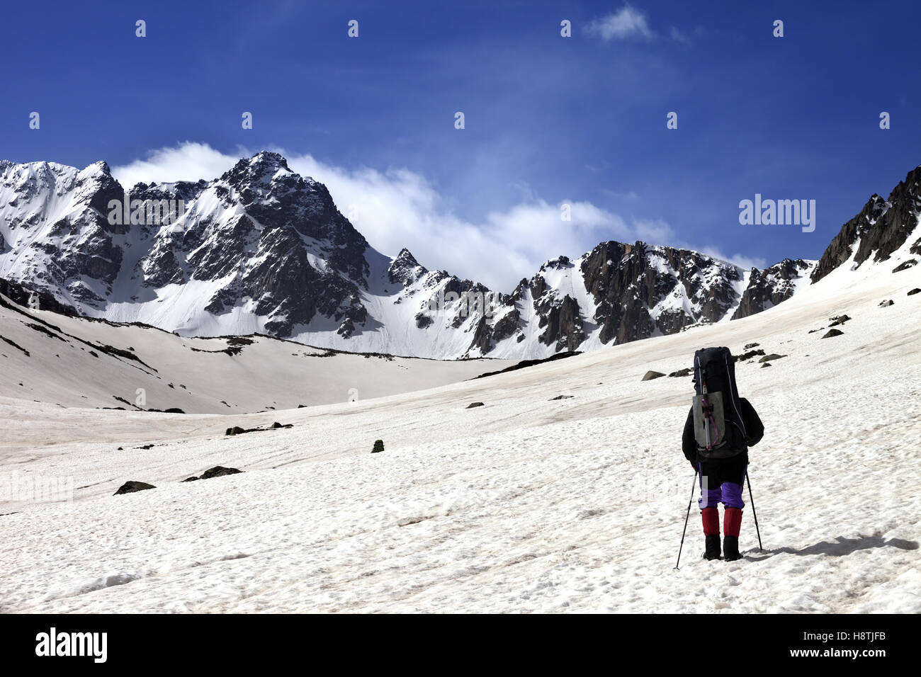 Hiker on snow plateau at spring mountain. Turkey, Kachkar (highest part ...