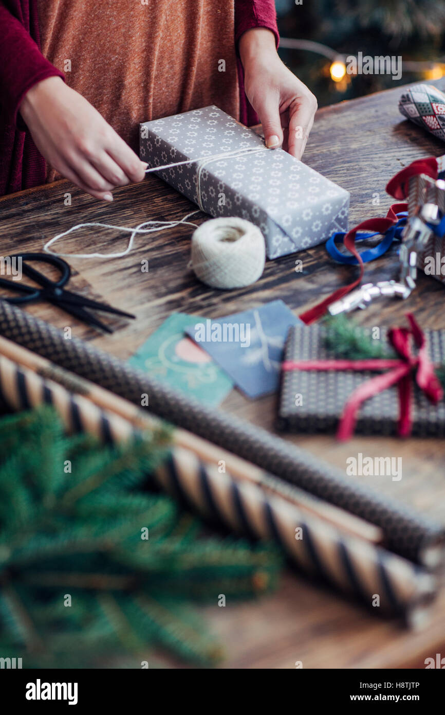 Woman hands wrapping gift hi-res stock photography and images - Alamy