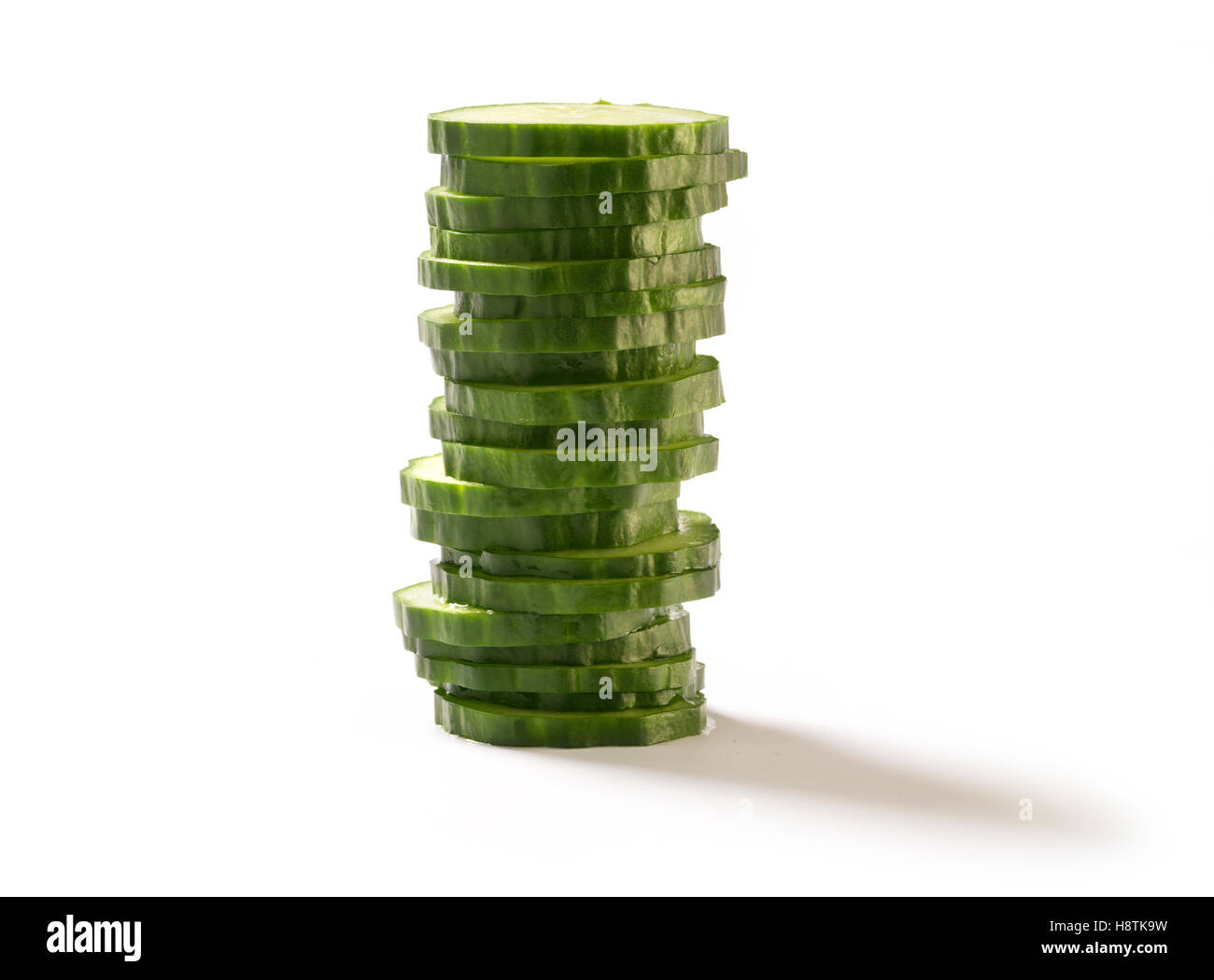 Sliced Cucumber in Stack of 20 isolated on white Stock Photo - Alamy