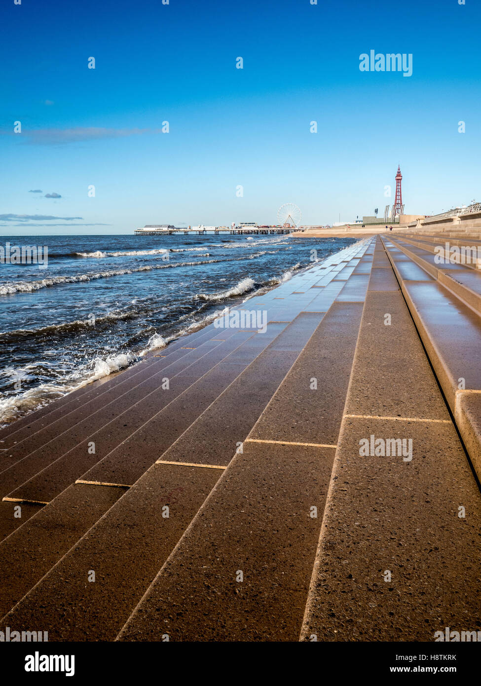 Blackpool Tower, Central Pier and stone steps forming part of sea ...