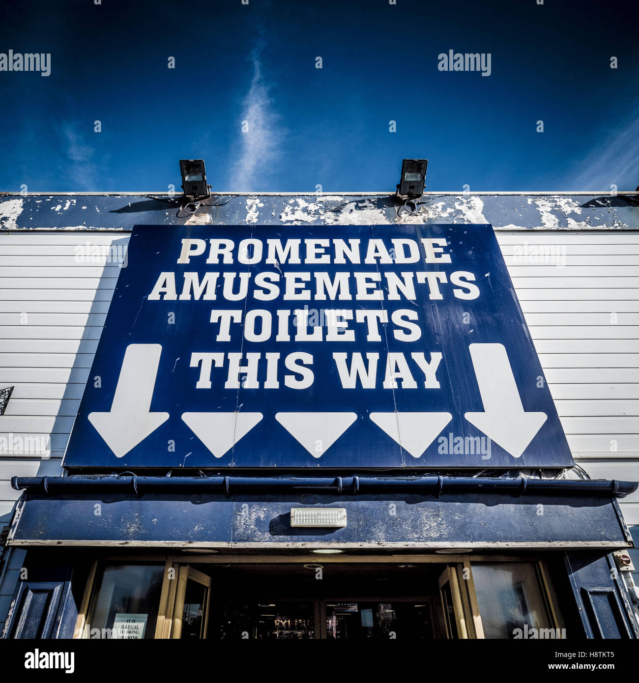 PROMENADE AMUSEMENTS TOILETS THIS WAY. Large sign on Central Pier ...