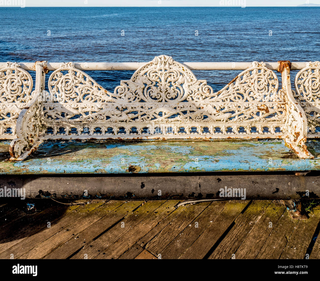Traditional cast iron seats in a state of disrepair on Pier, Blackpool ...