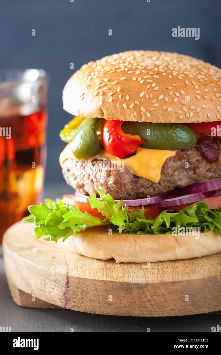 homemade cheese burger with peppers tomato onion Stock Photo - Alamy