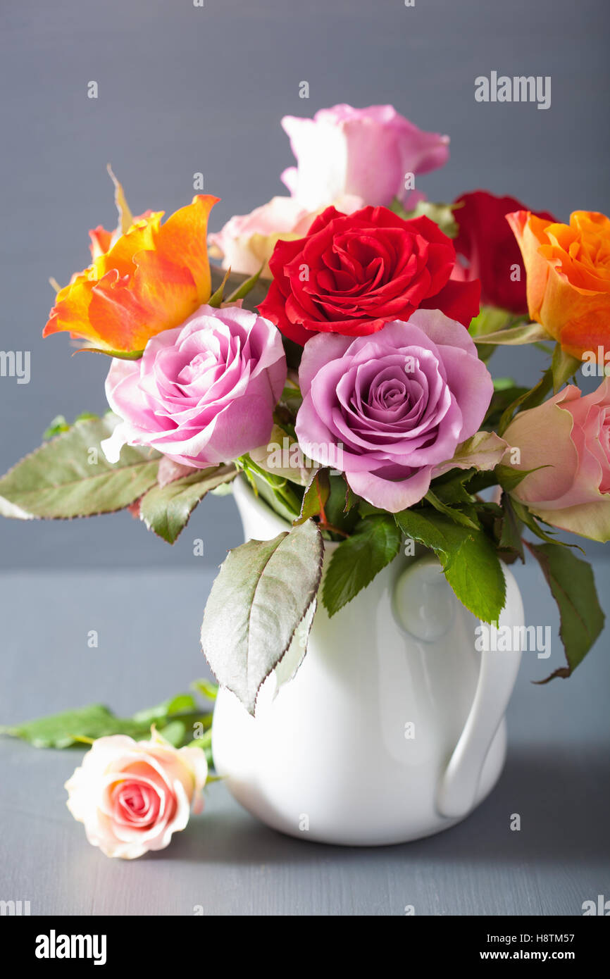 beautiful colorful rose flowers bouquet in vase Stock Photo - Alamy