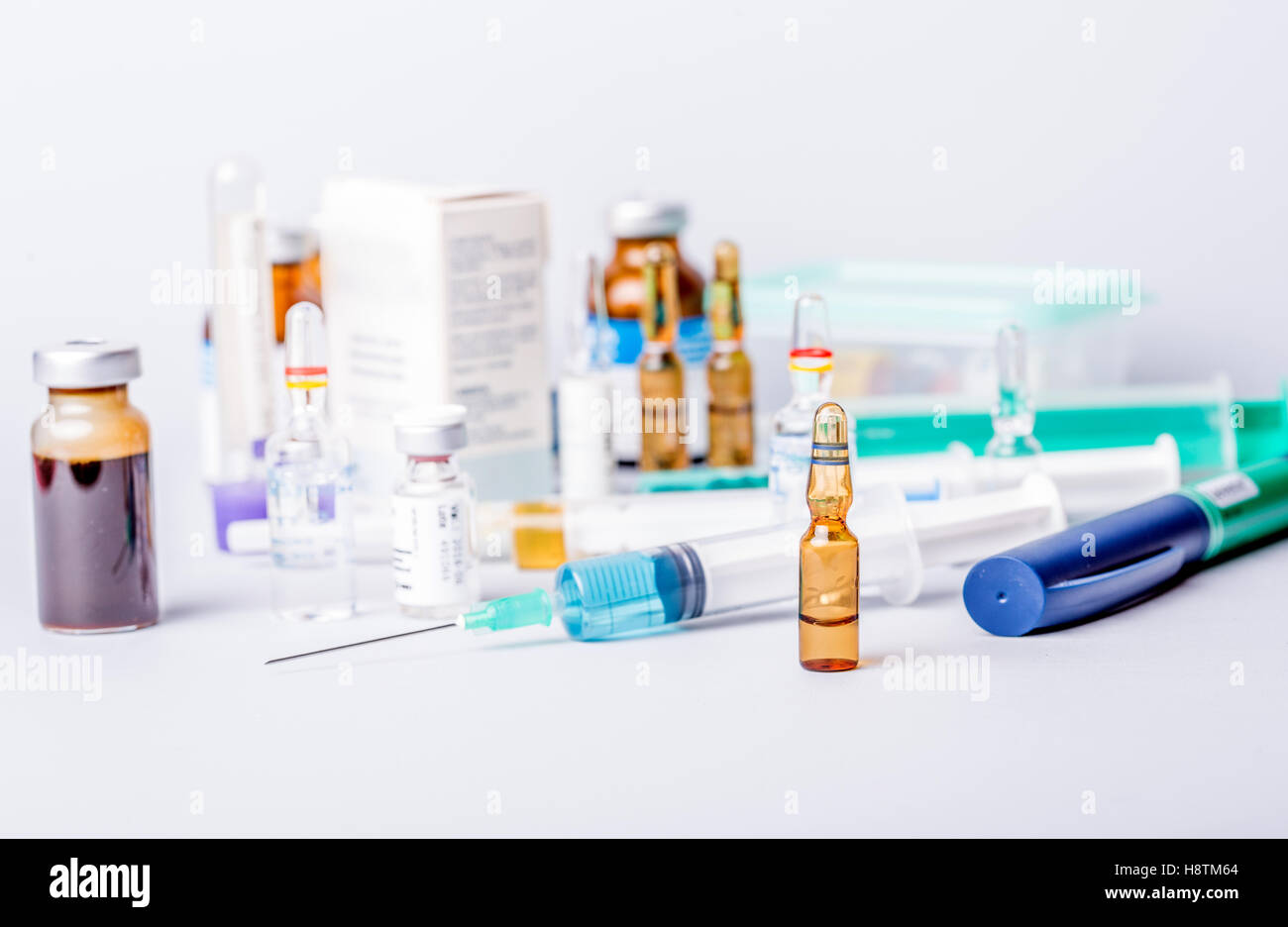 syringes with ampules of drugs Stock Photo - Alamy