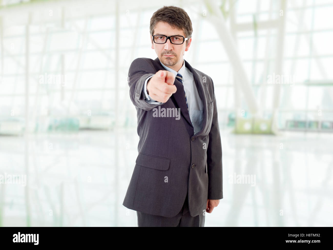 young business man pointing, at the office Stock Photo - Alamy