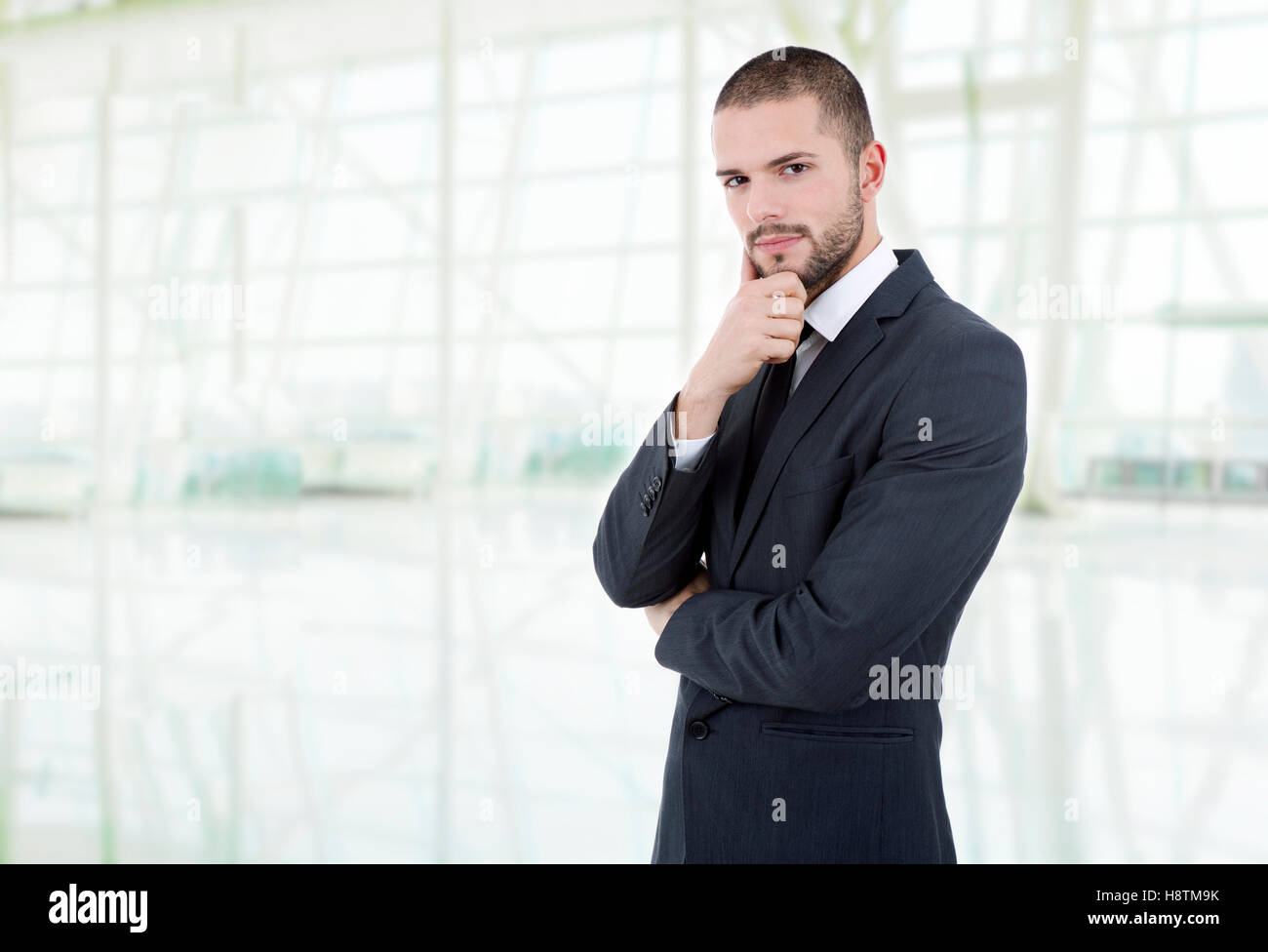 young business man thinking at the office Stock Photo - Alamy
