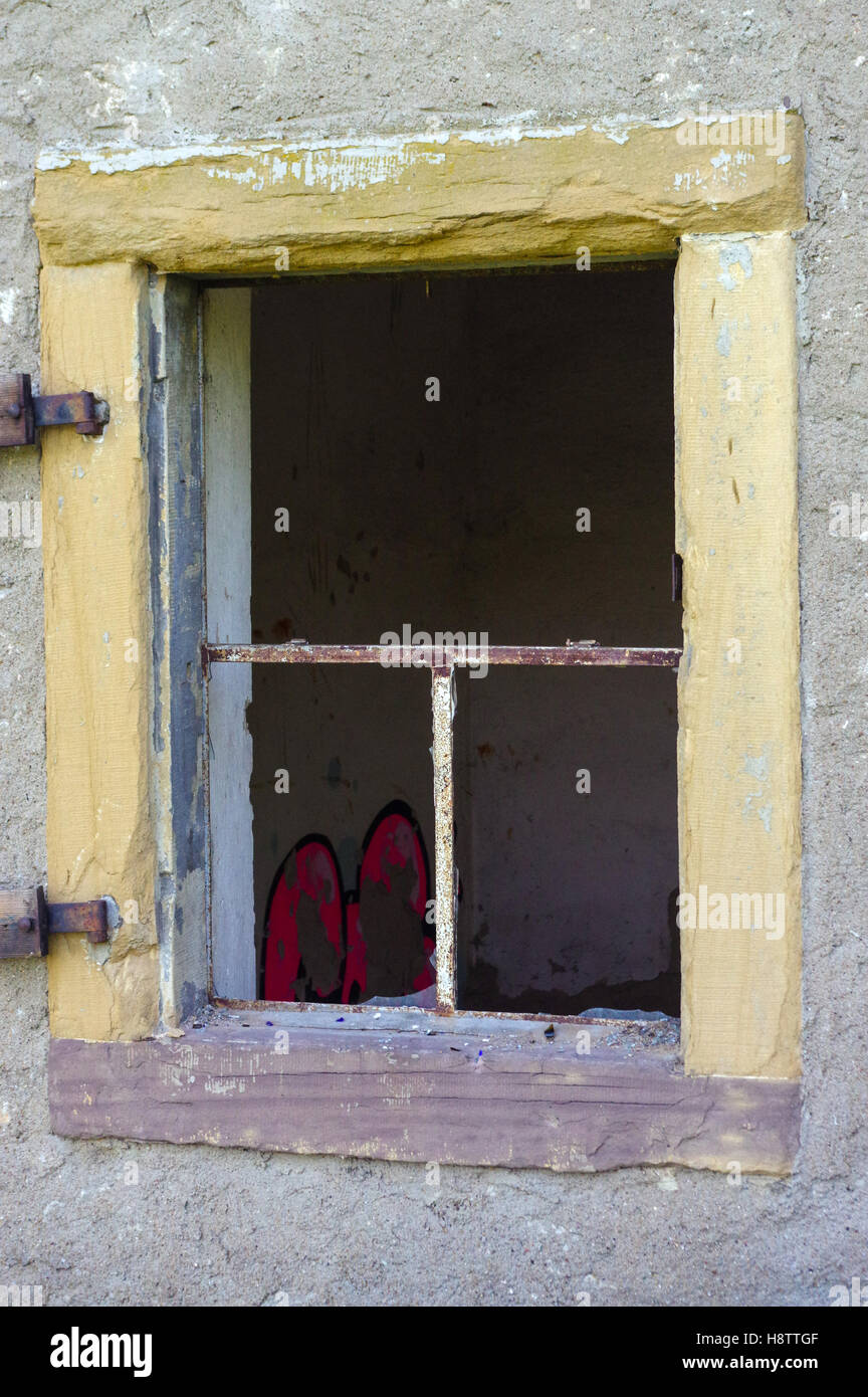 an old open broken window on wall Stock Photo - Alamy