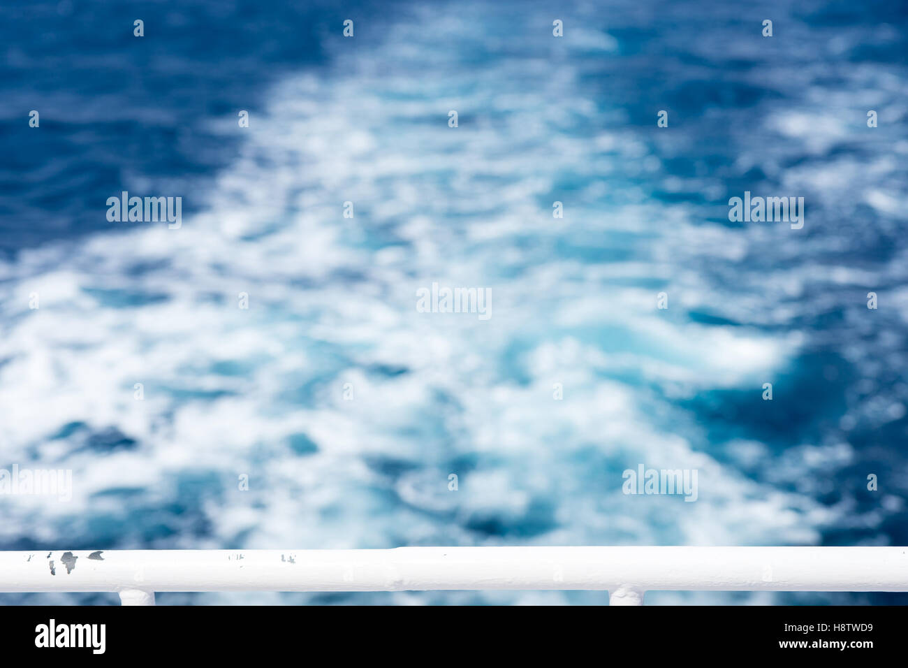 Ship's wake from the yacht, focus on handrail Stock Photo - Alamy