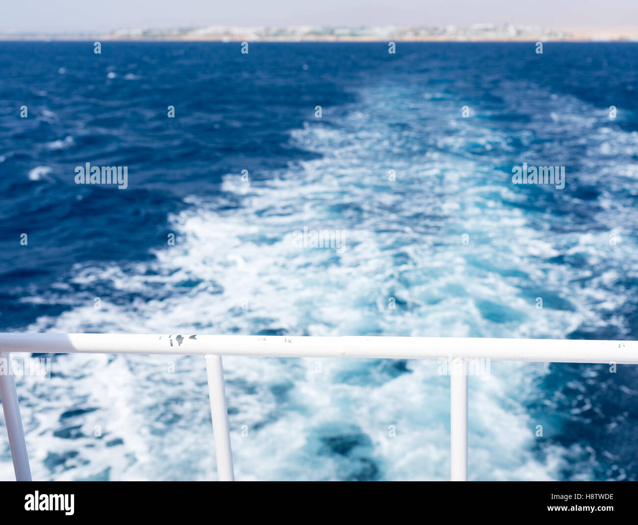 View of ship's wake from vessel through handrail Stock Photo - Alamy
