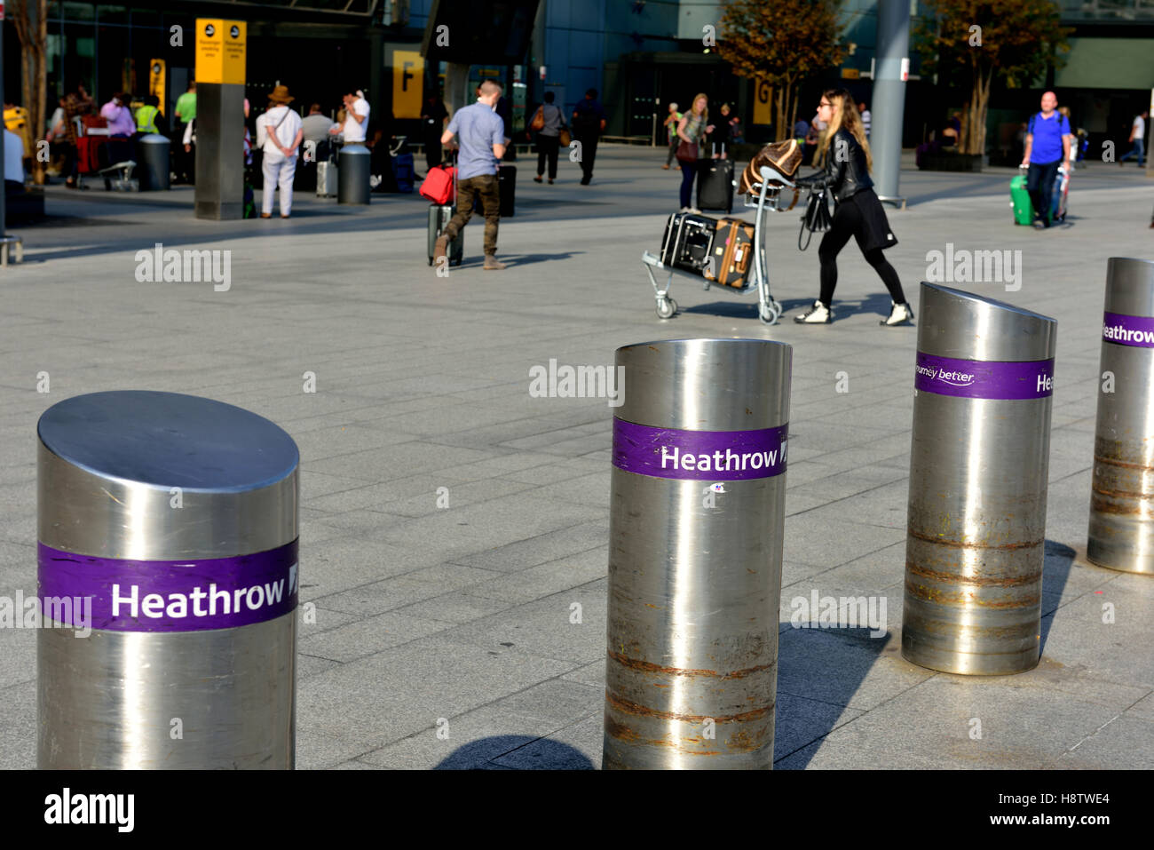 Heathrow airport terminal 3, entrance with security bollards, London ...