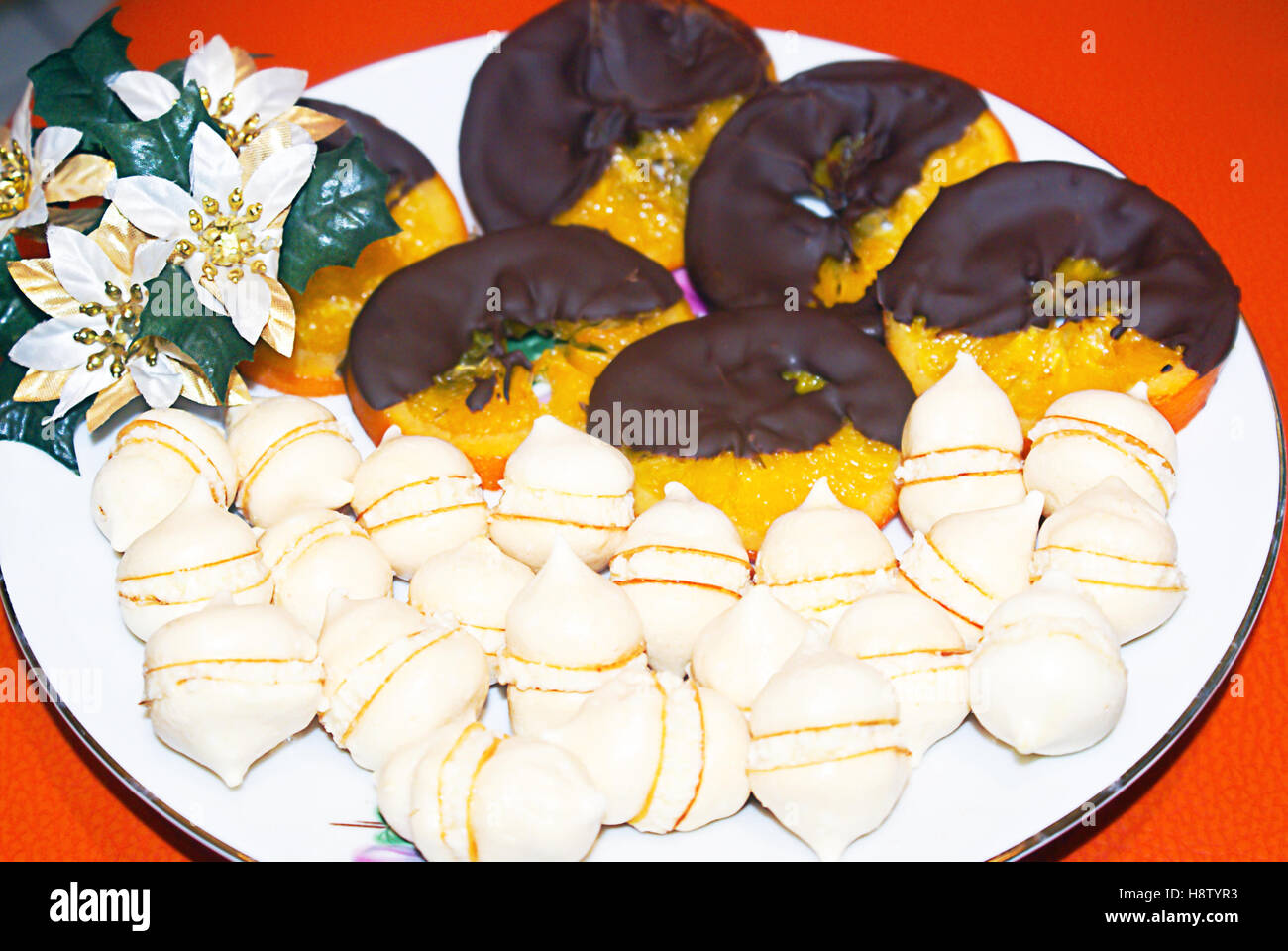 On the Plate Are: Orange Meringue and Chocolate Stock Photo - Alamy