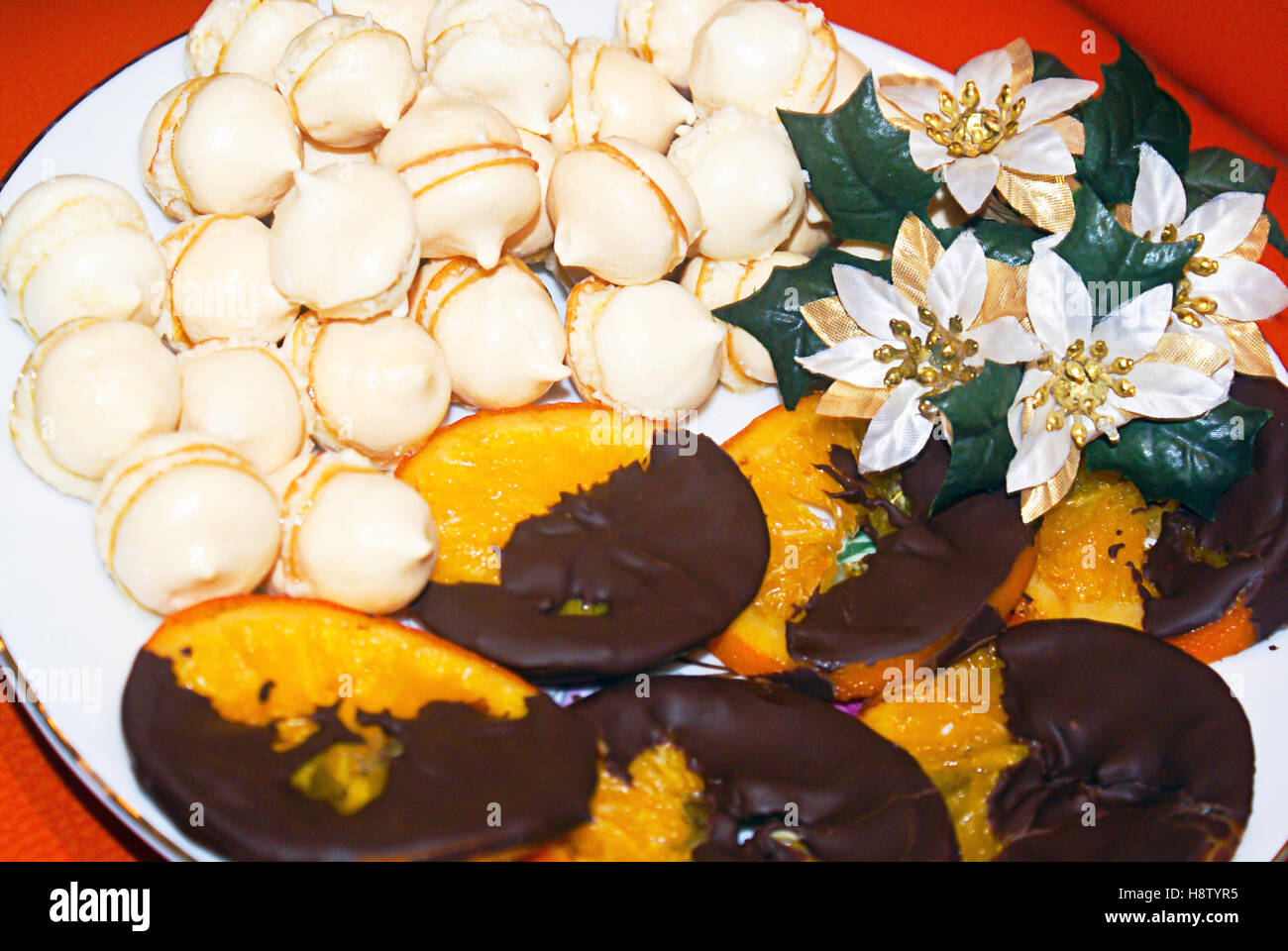 On the Plate Are: Orange Meringue and Chocolate Stock Photo - Alamy