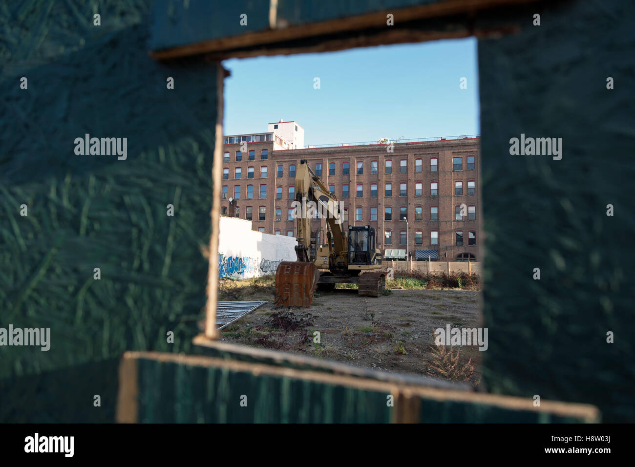View Through Fence at Construction Site Rubble Stock Photo - Alamy