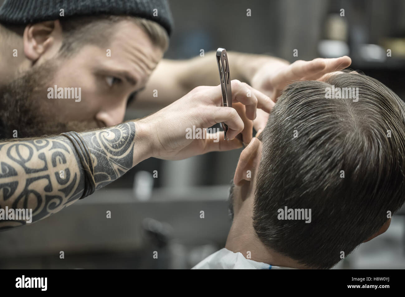 Barber trimming man hi-res stock photography and images - Alamy