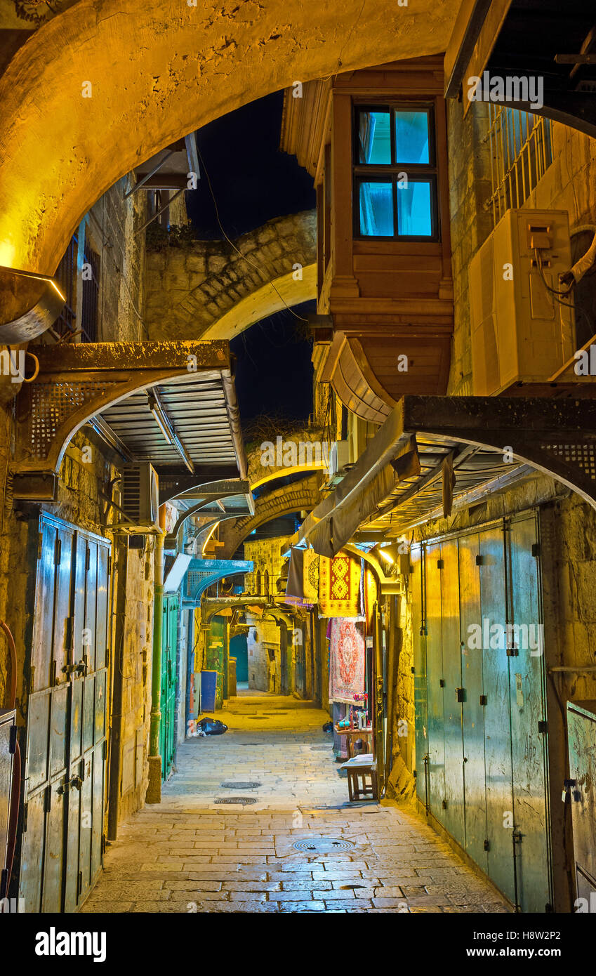 The empty market in Via Dolorosa street with the only one open rug ...