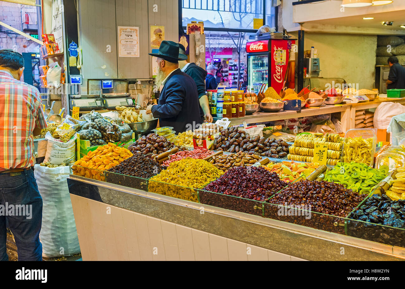 The shop offers the dried fruits, nuts and many types of raisins ...