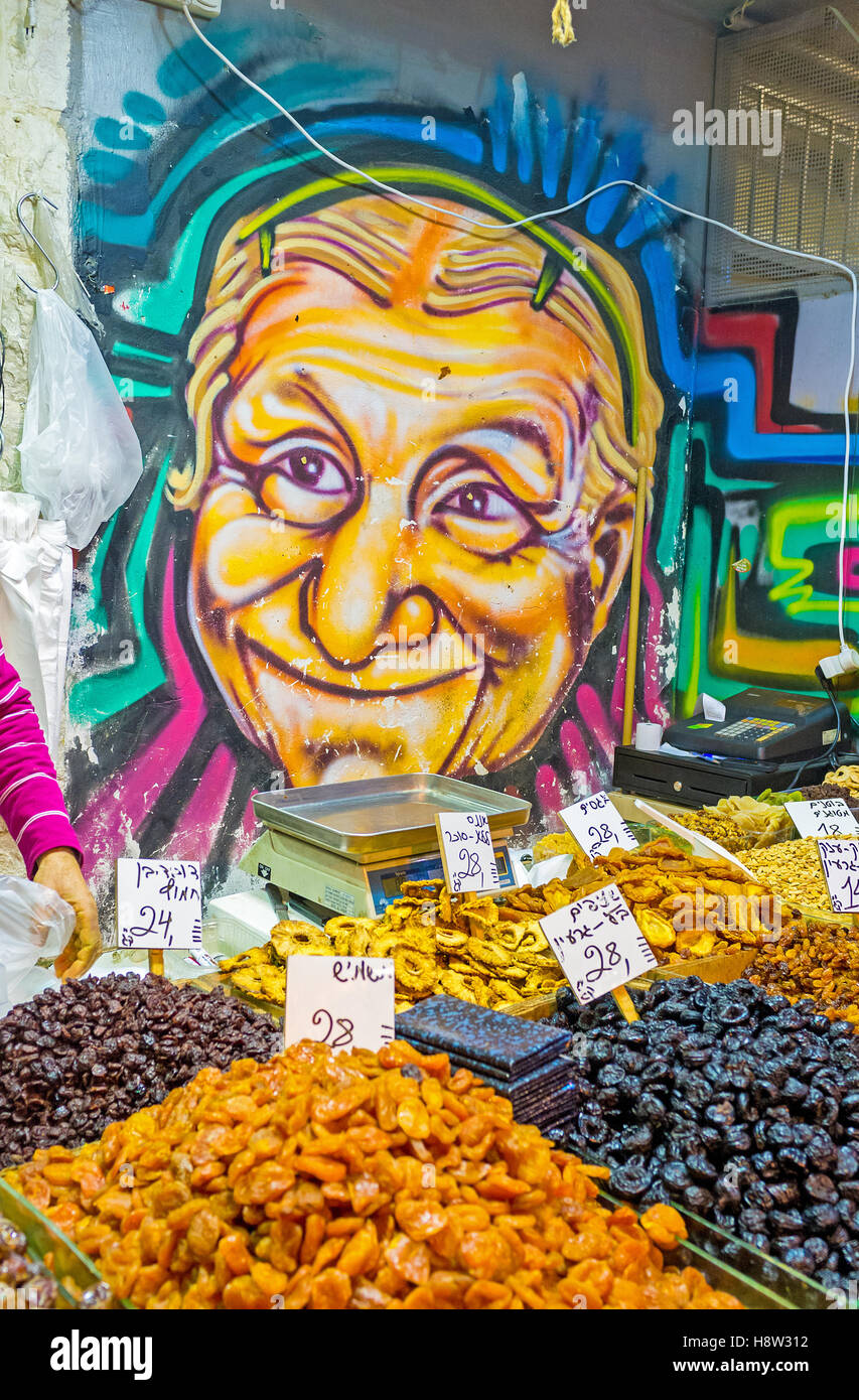 The mural, depicting the happy smiling merchant in the dried fruits ...