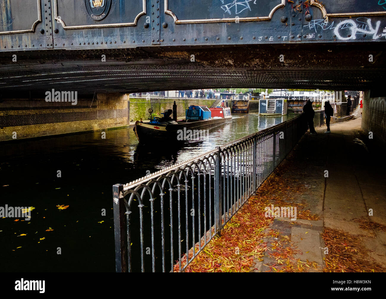 The Regents Canal and towpath under Chalk Farm Road bridge at Camden ...