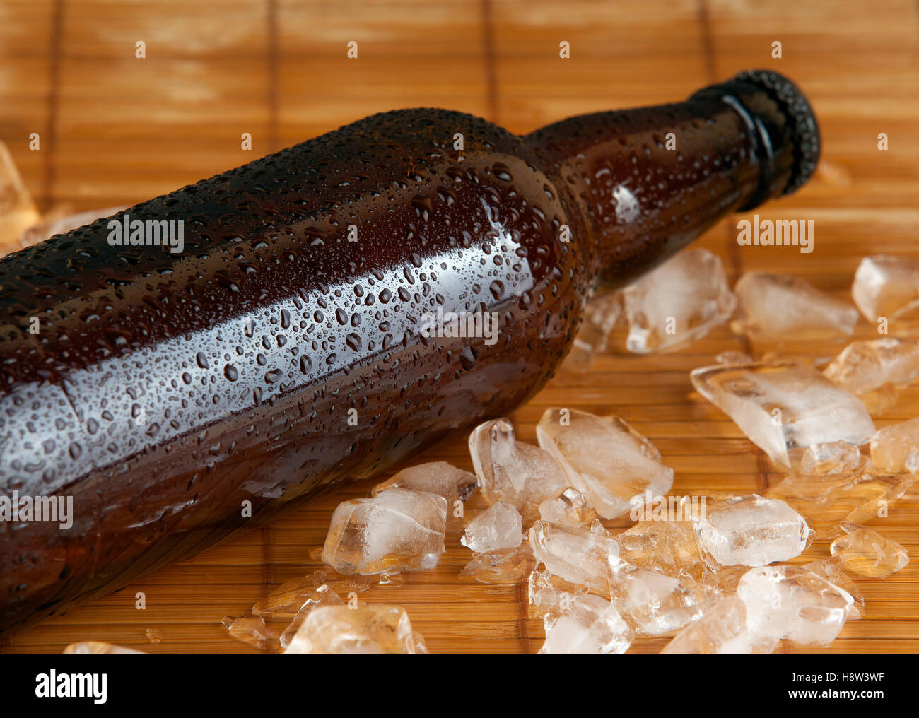 Bottle of beer with drops Stock Photo - Alamy
