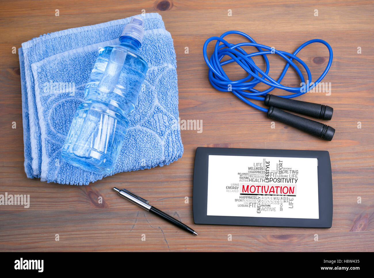 MOTIVATION word cloud, fitness, sport, health concept. On tablet device ...