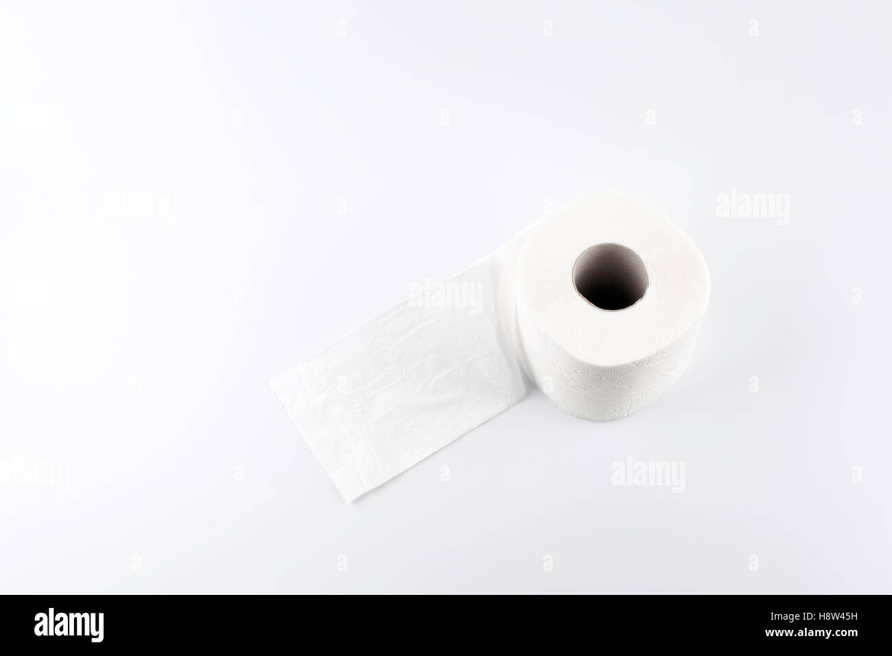 toilet paper on white background Stock Photo - Alamy